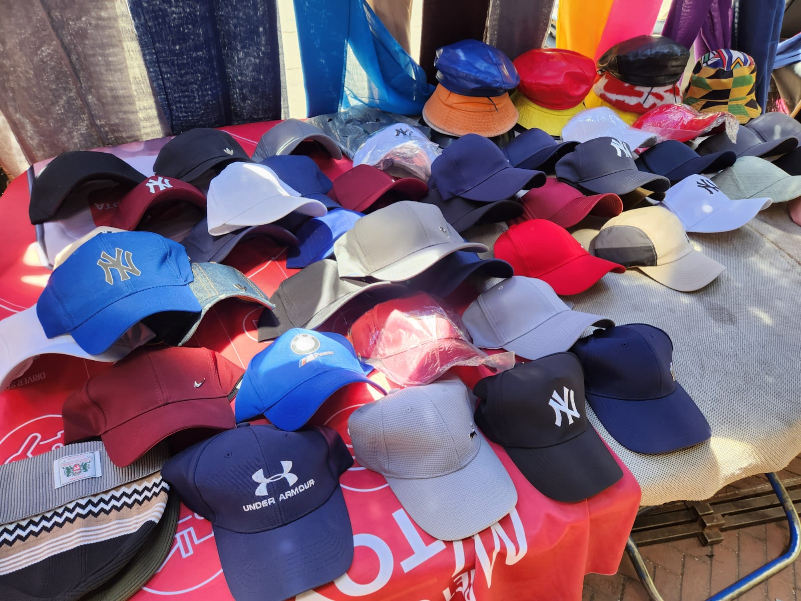 Police Raid In Joburg CBD Nets Fake Branded Shoes, Bags, Caps, Watches ...